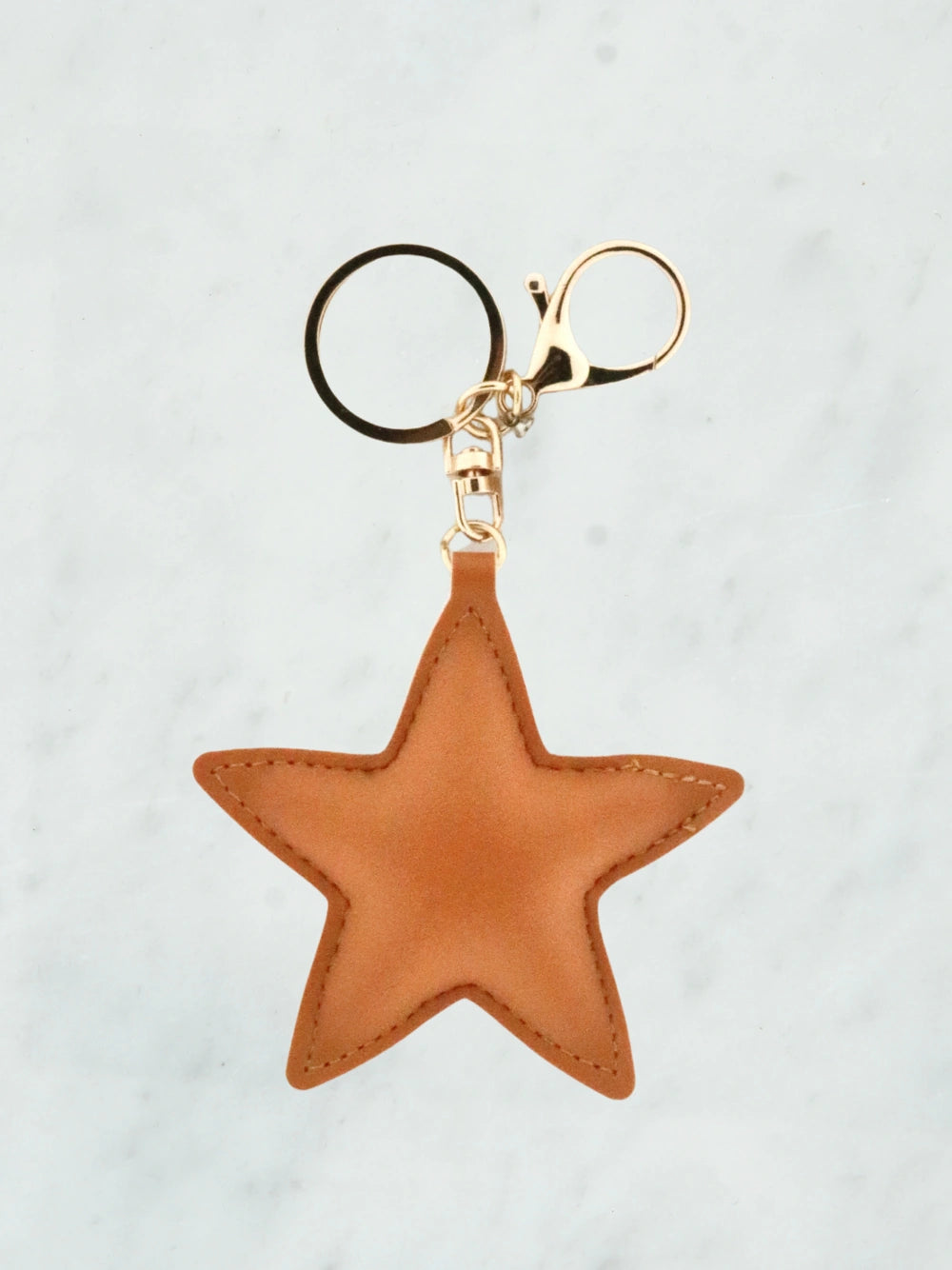 Twinkle tan star bag charm